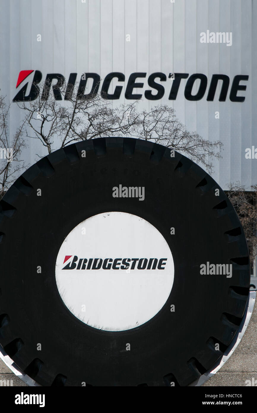 A logo sign outside of a facility occupied by the Bridgestone ...