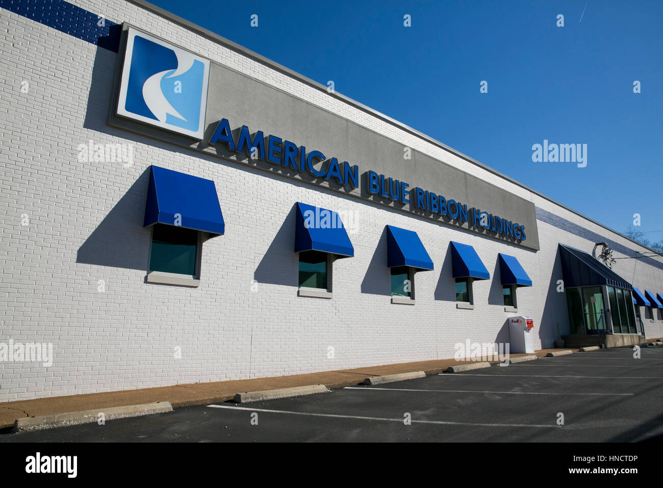 A logo sign outside of the headquarters of American Blue Ribbon ...