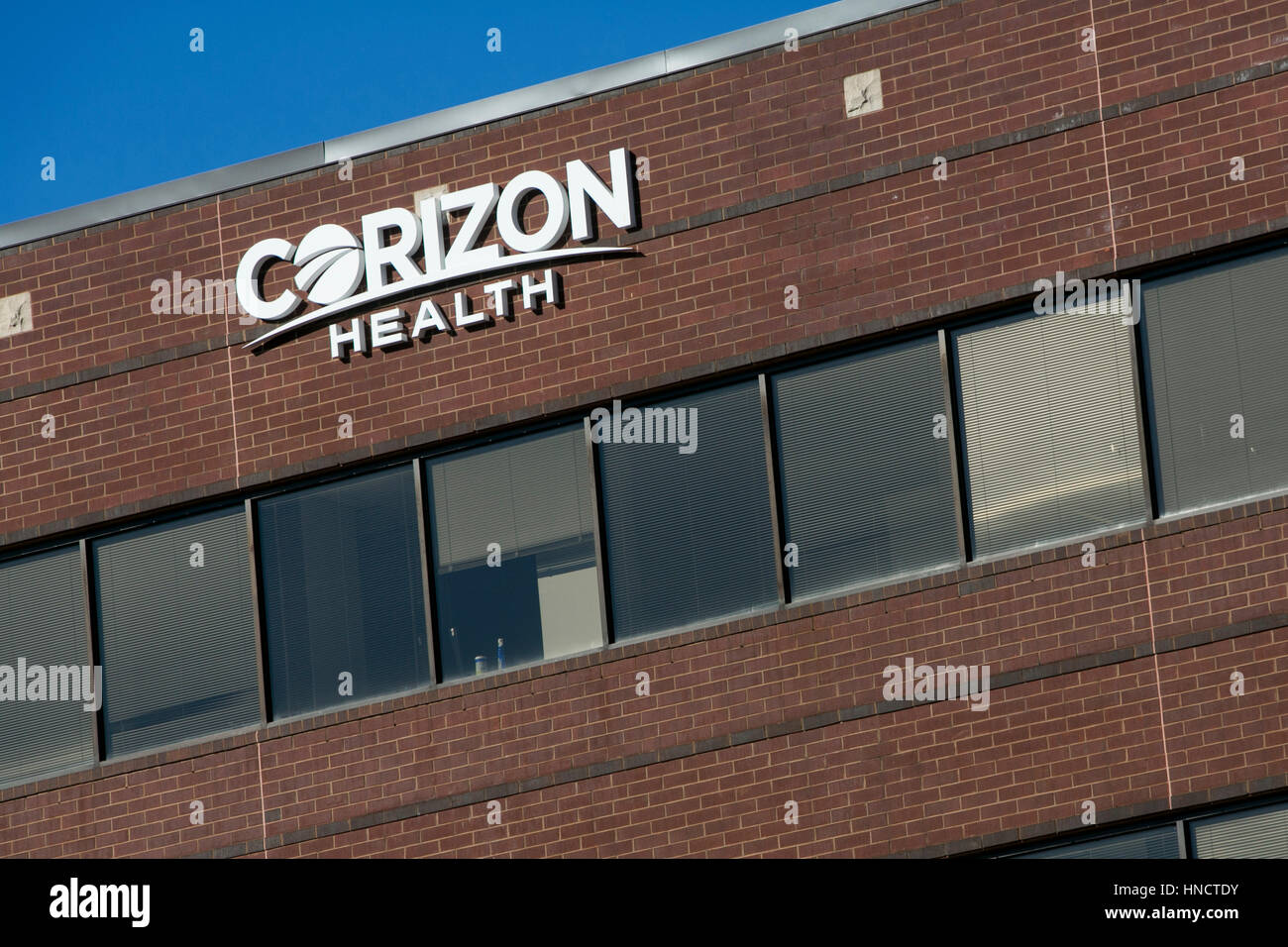 A logo sign outside of the headquarters of Corizon Health, Inc., in ...