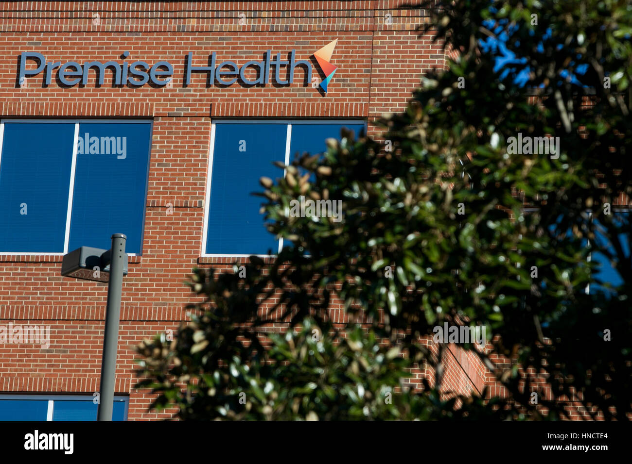 A logo sign outside of the headquarters of Premise Health in Brentwood ...