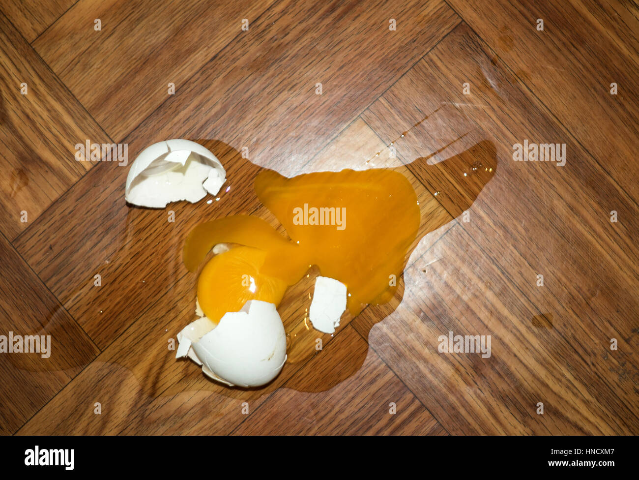 Breaking egg floor hi-res stock photography and images - Alamy