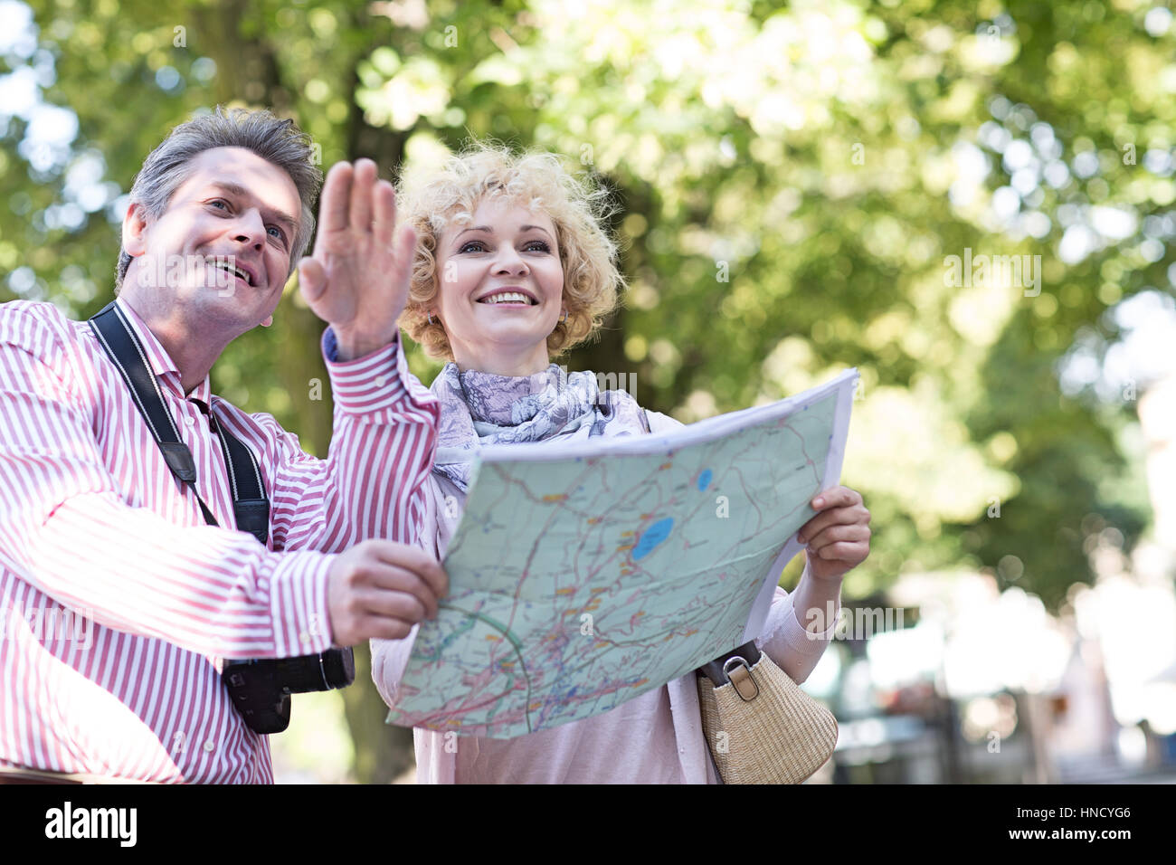 Holding map hi-res stock photography and images - Alamy