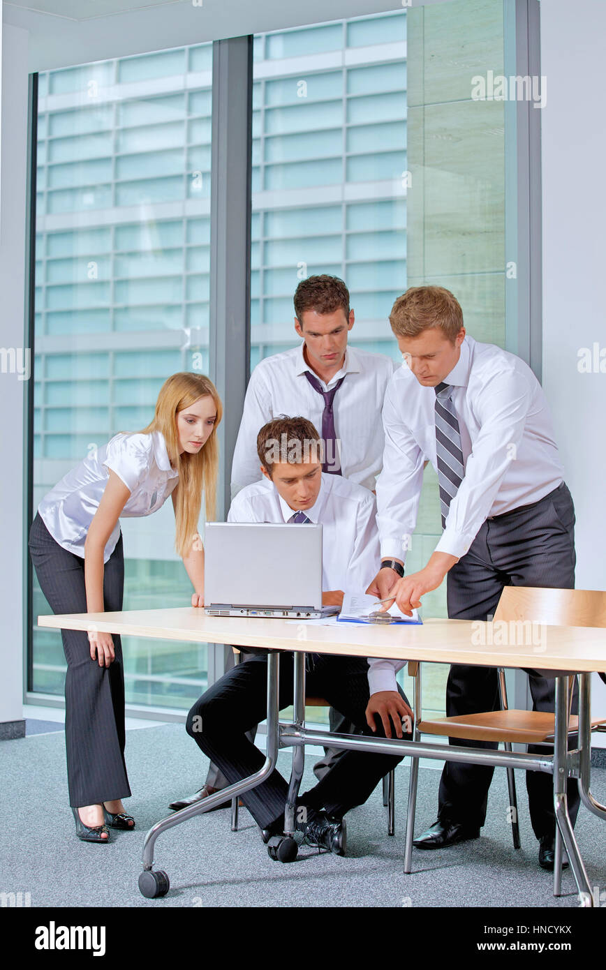 Business team working in office Stock Photo - Alamy
