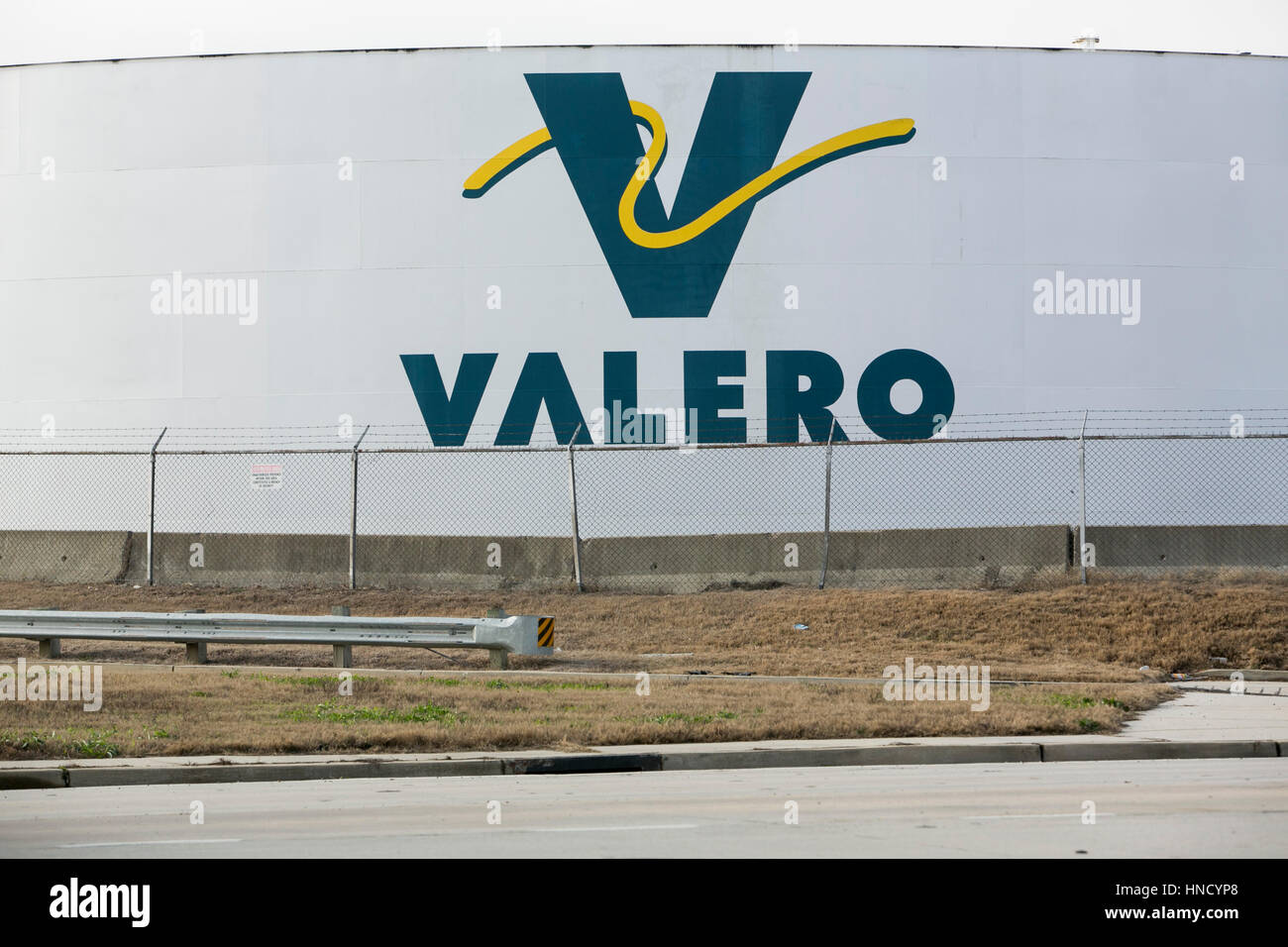 A logo sign outside of a facility occupied by the Valero Energy ...