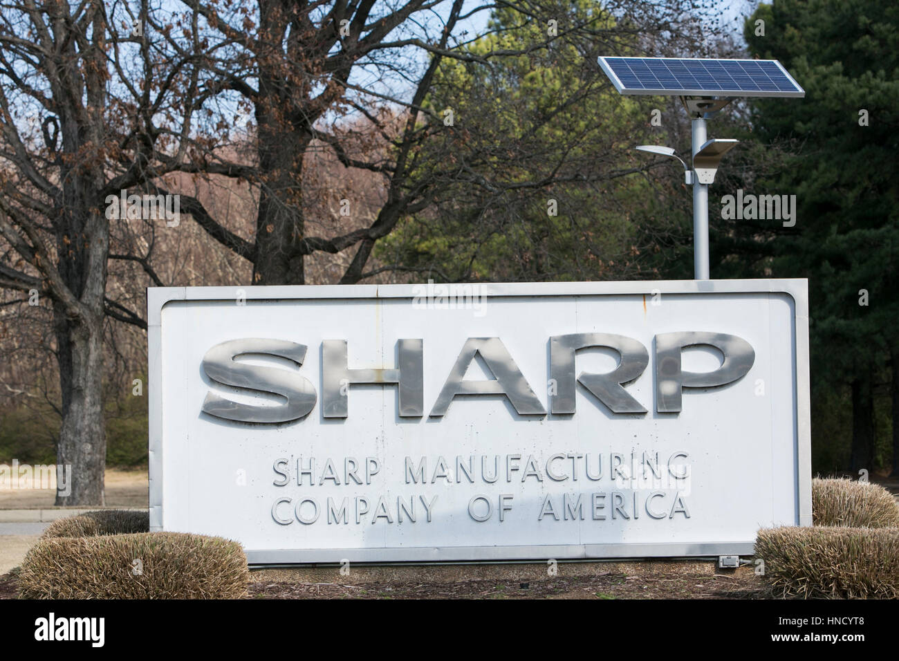 A logo sign outside of a facility occupied by the Sharp Corporation in ...