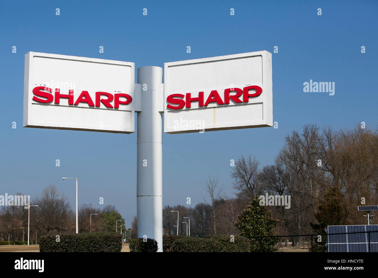 A logo sign outside of a facility occupied by the Sharp Corporation in ...