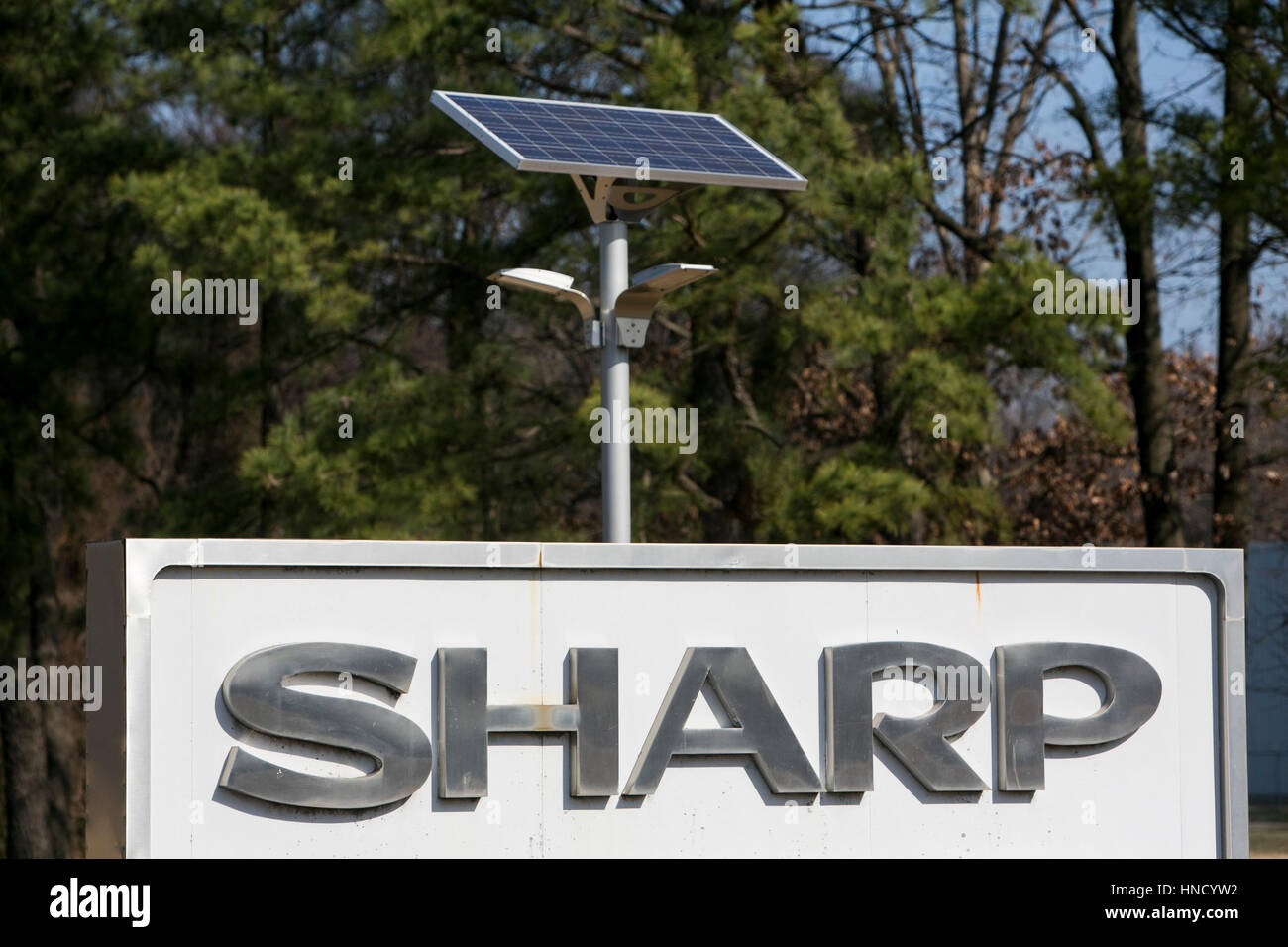 A logo sign outside of a facility occupied by the Sharp Corporation in Memphis, Tennessee on ...