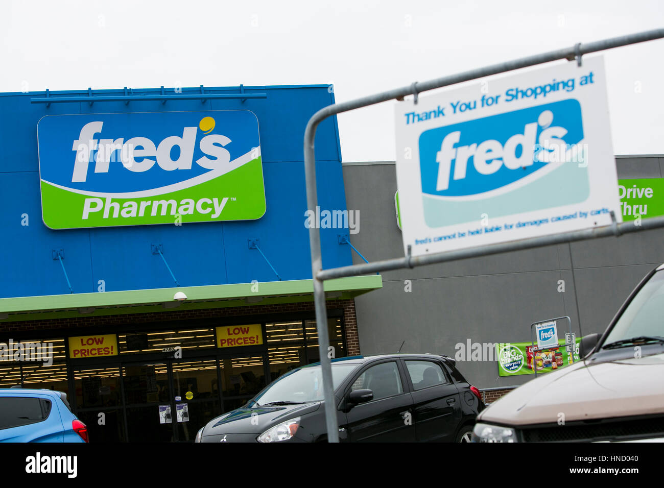 A logo sign outside of the headquarters of Fred's Pharmacy Memphis ...