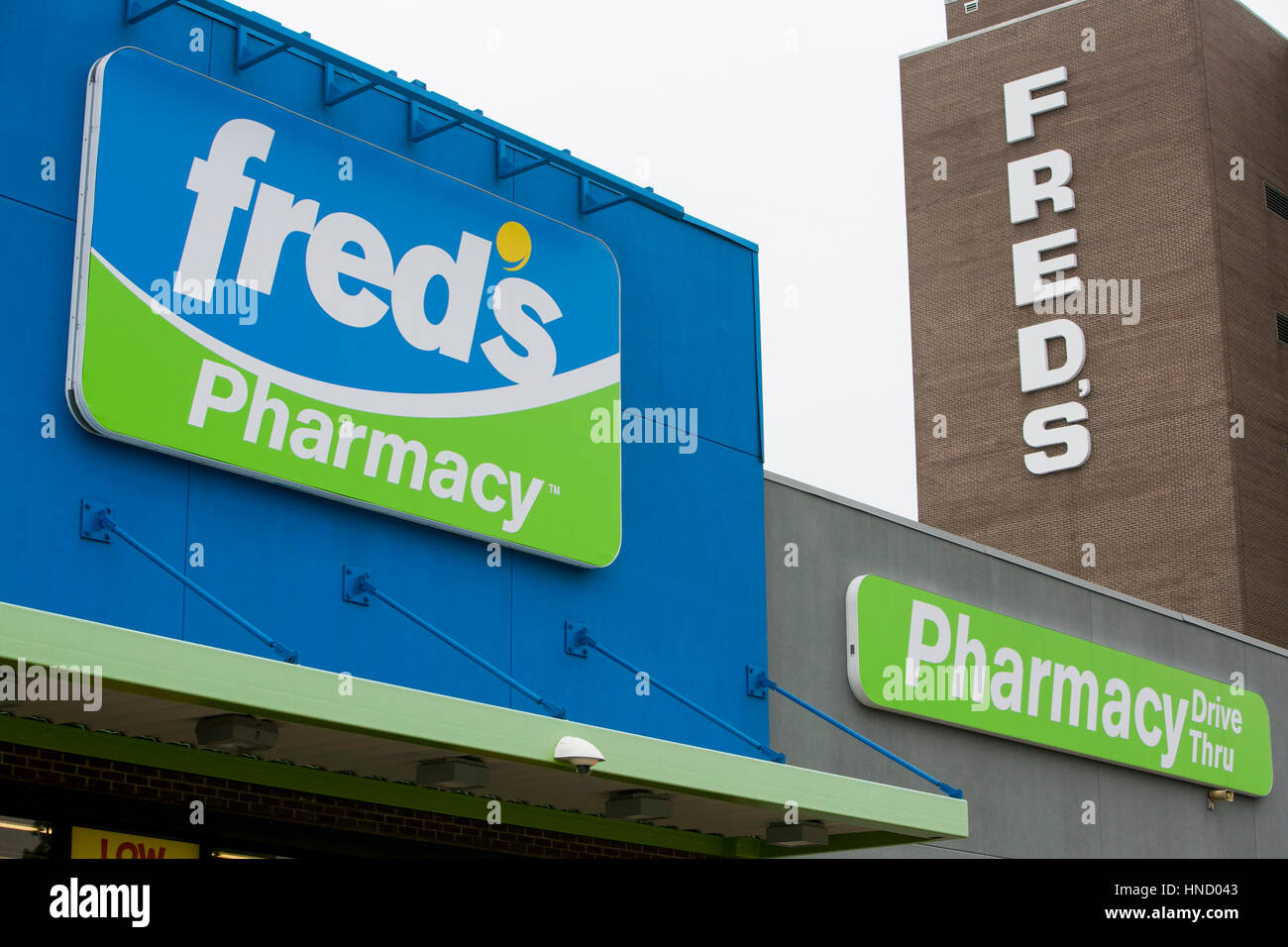 A logo sign outside of the headquarters of Fred's Pharmacy Memphis ...