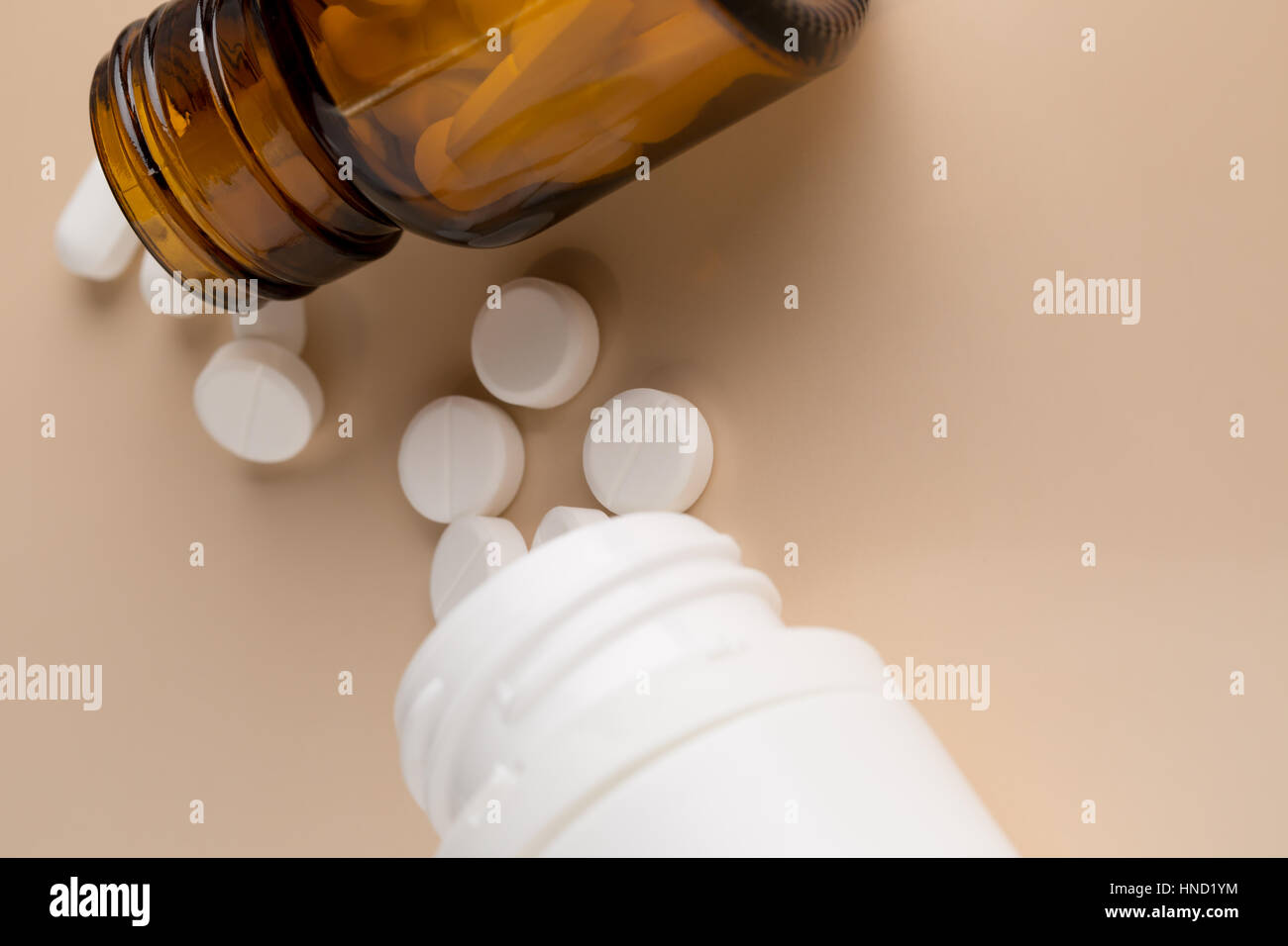 Glass and plastic pills bottle Stock Photo - Alamy
