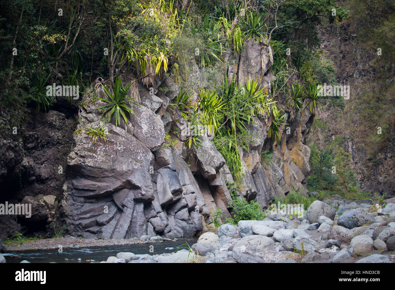 Ile de la Reunion island tropical landscape river stone rock formation ...