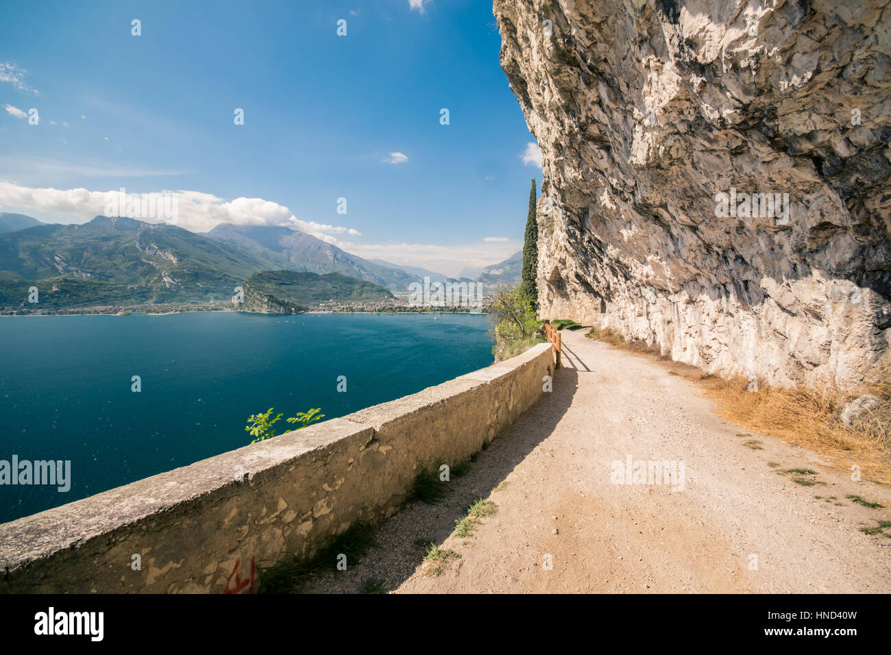 The Ponale trail carved into the rock of the mountain in Riva del Garda ...