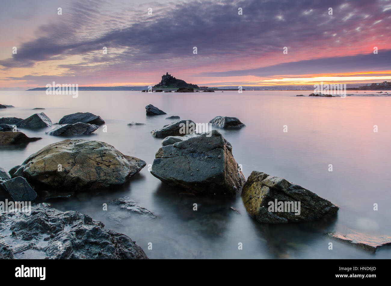 Sunset at St Michael's Mount, Marazion, Cornwall, with a rocky ...