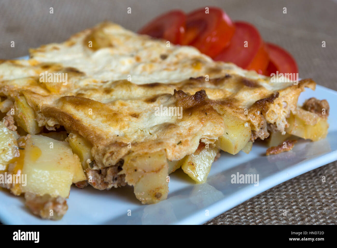 Moussaka - a traditional Balkan specialty with minced meat and potatoes ...