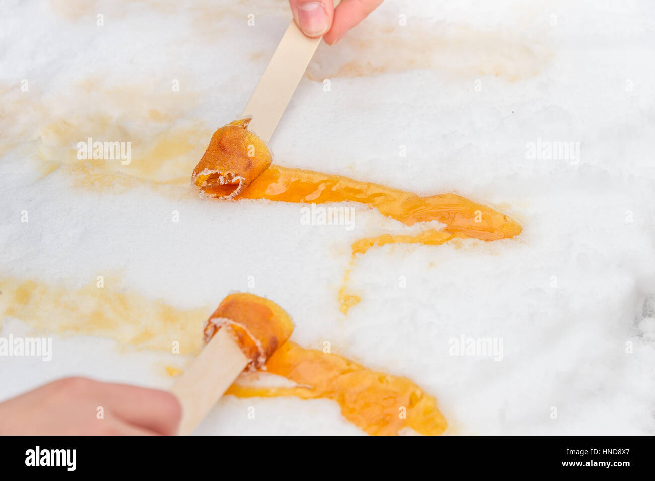Maple taffy on snow at the sugar shack, in Montreal, Canada (2017 Stock ...