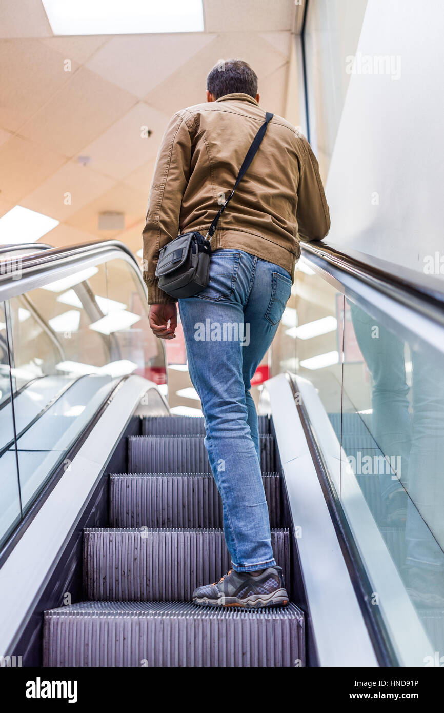 Man moving up stairs hi-res stock photography and images - Alamy