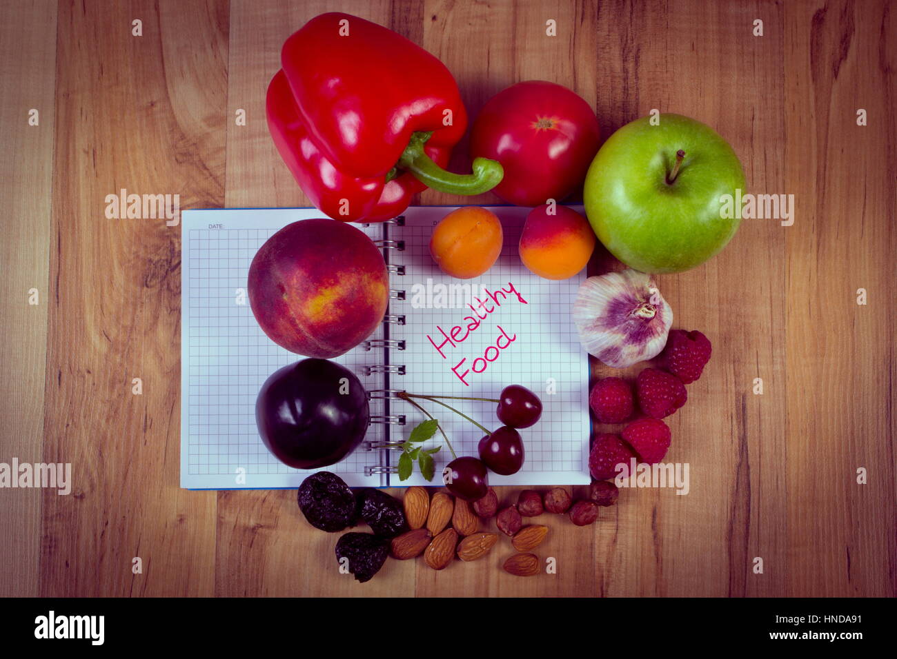 Vintage photo, Fresh fruits and vegetables with notebook for writing ...