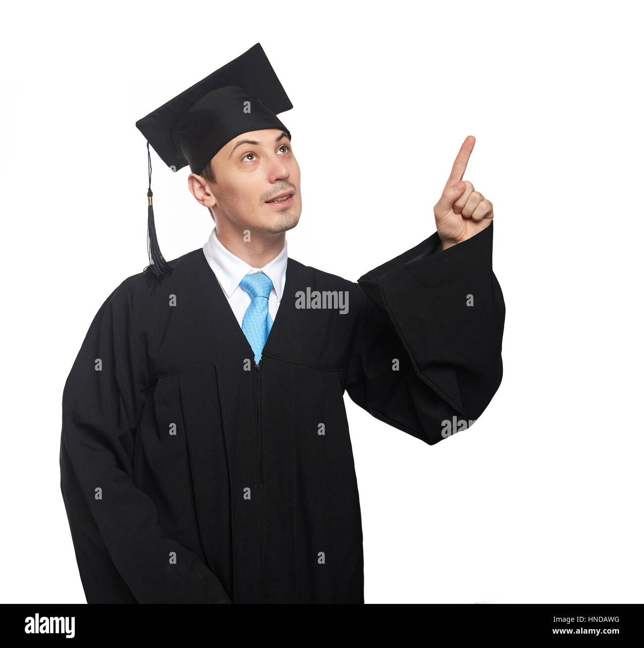 Student graduation thinking and looking up with finger up Stock Photo ...