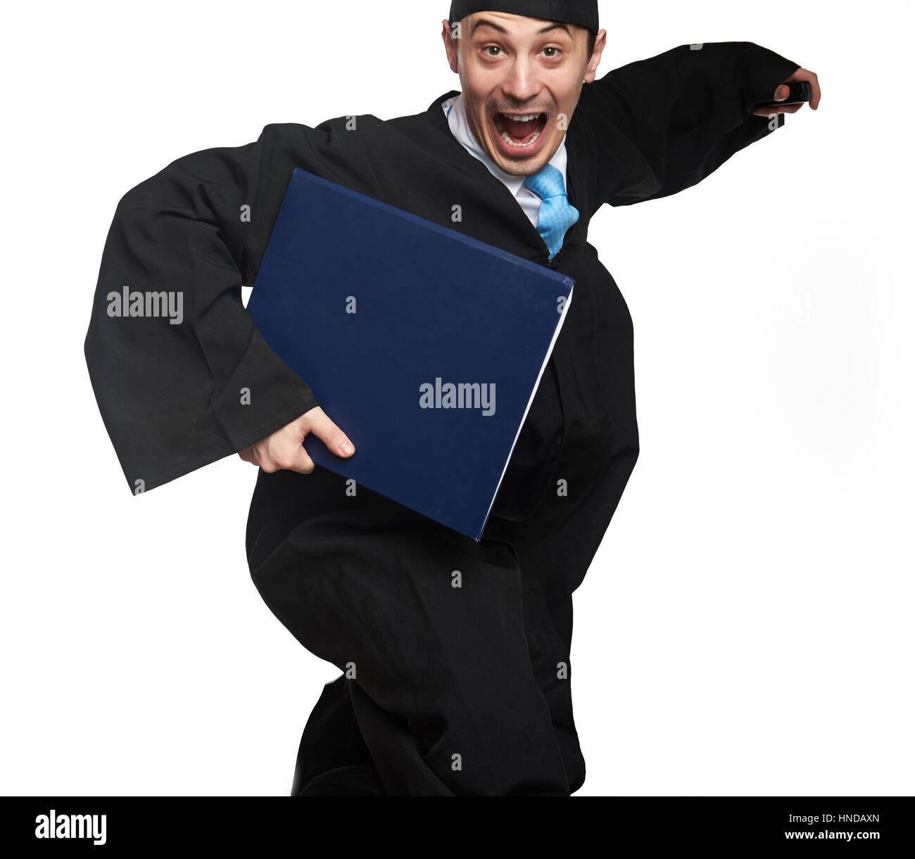 Jumping graduating student with diploma isolated on white background ...