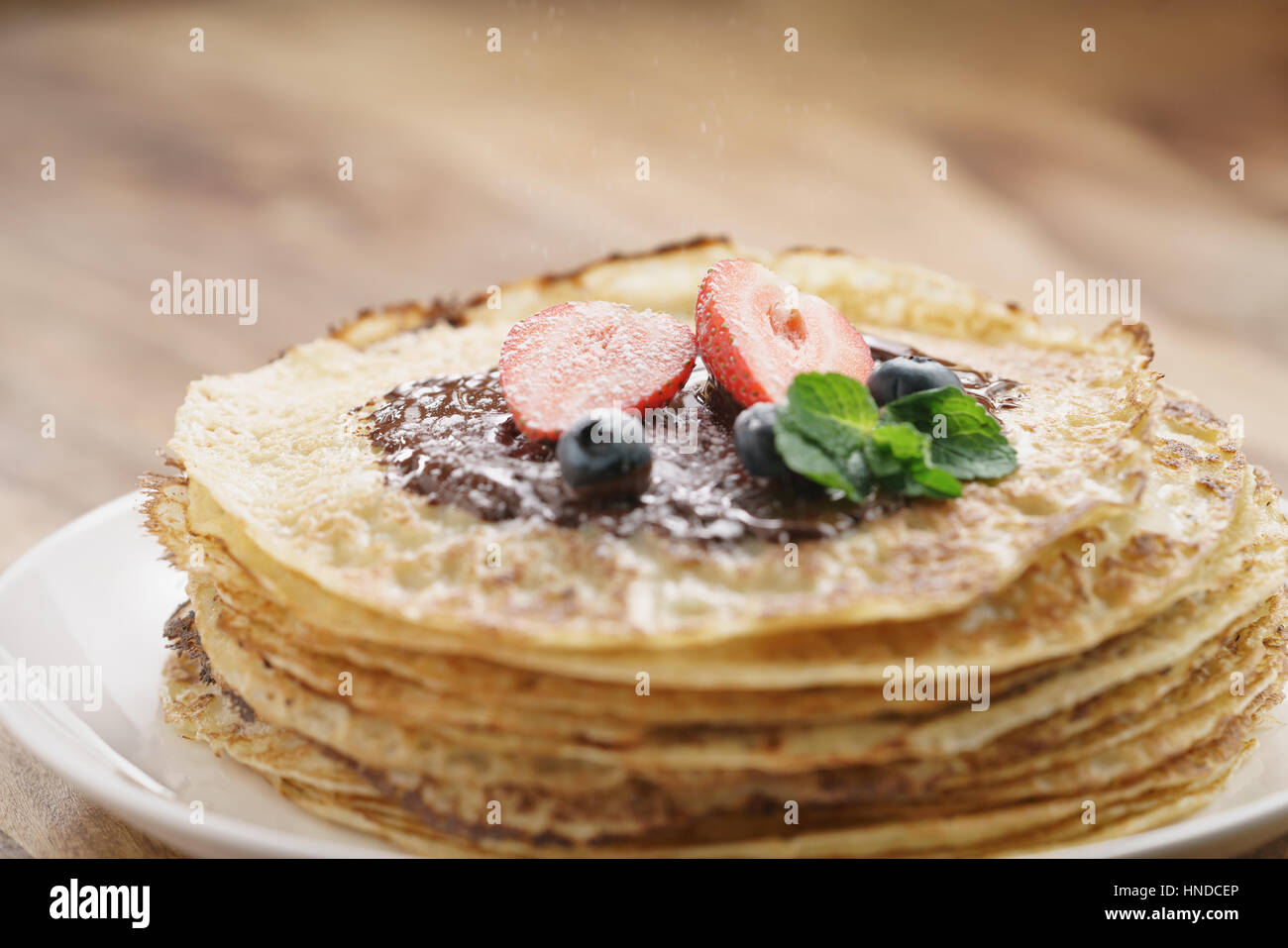 Crepes melted dark chocolate hi-res stock photography and images - Alamy