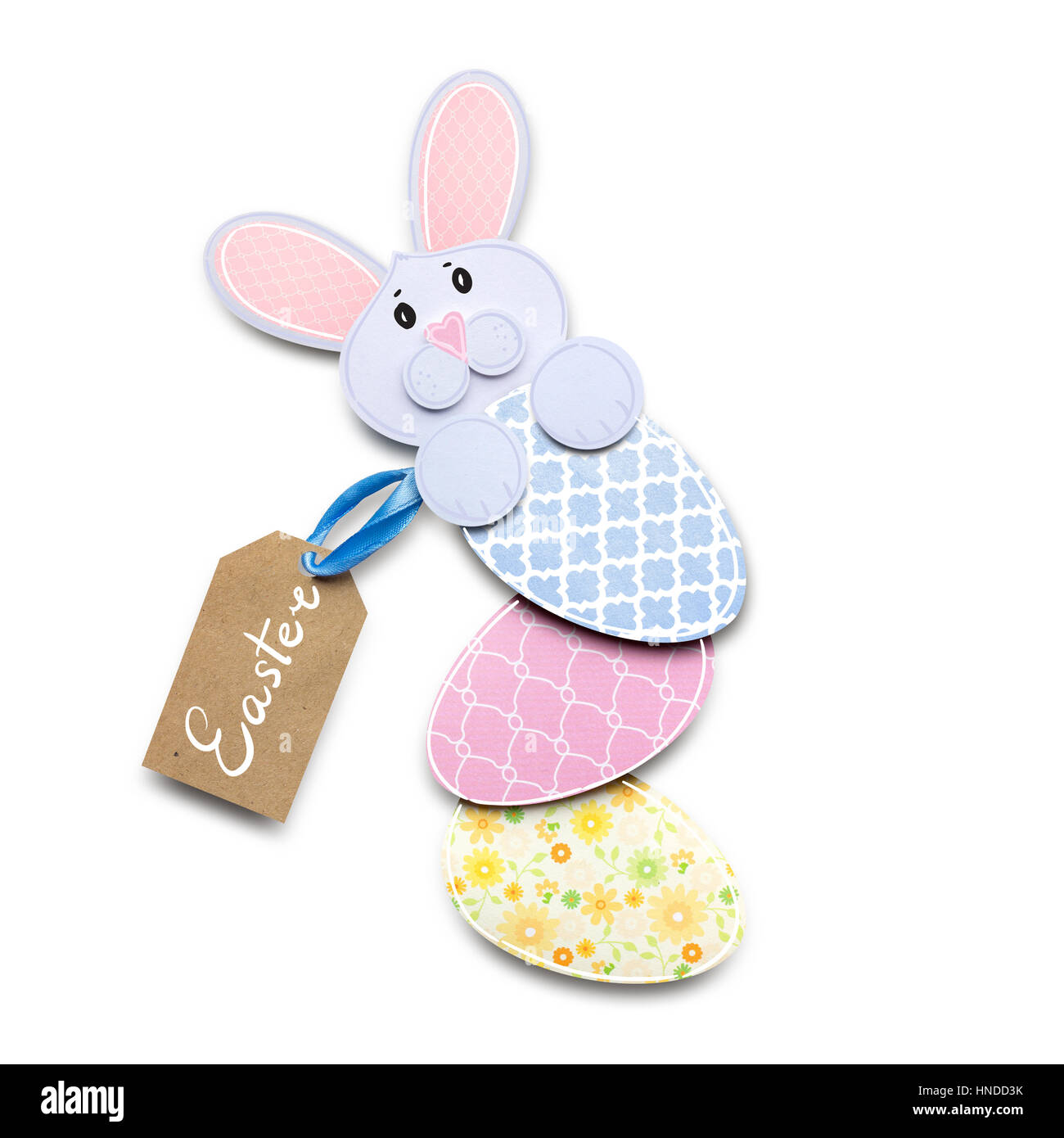 Creative easter concept photo of a rabbit with an egg made of paper on ...