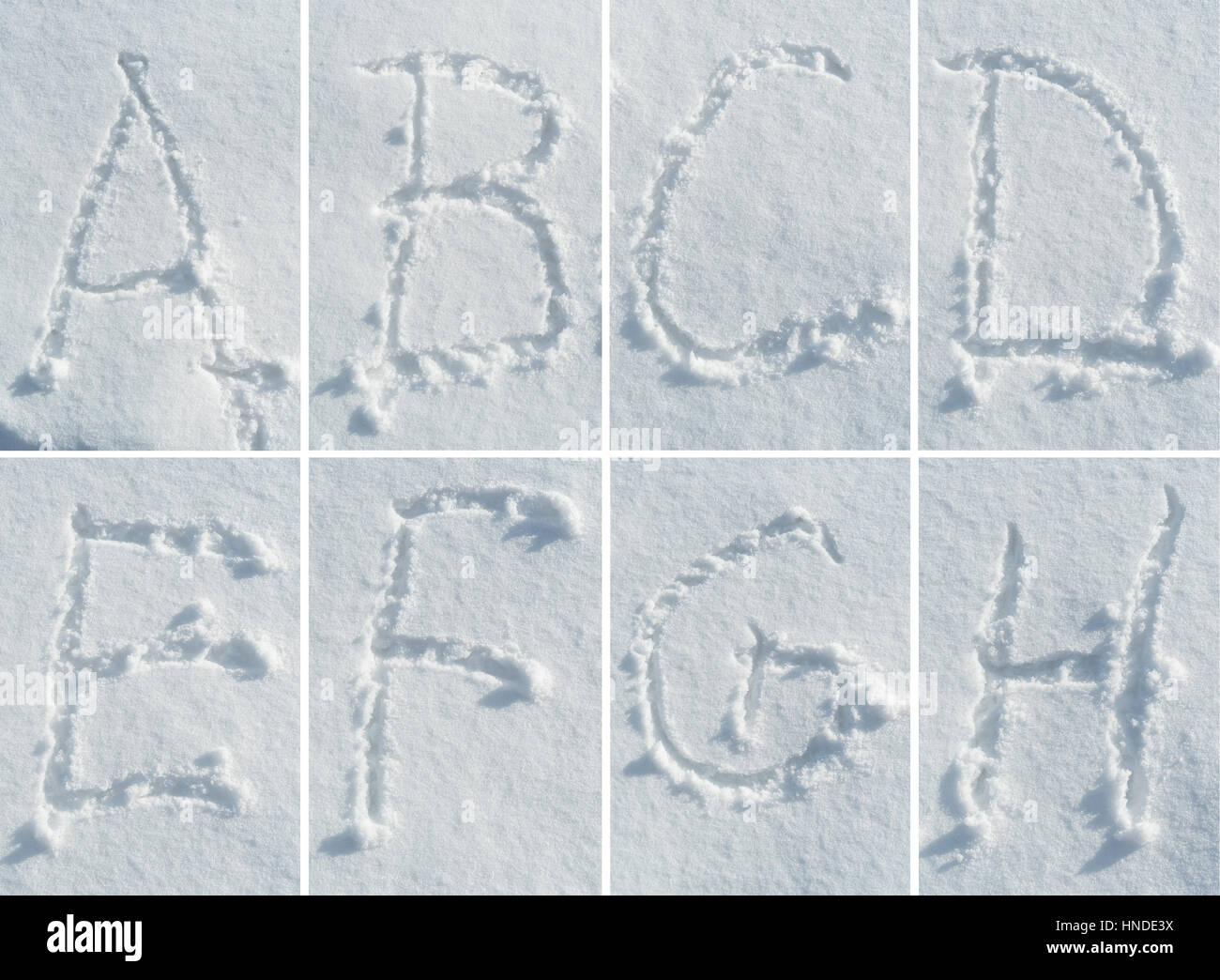 English hand-written alphabet in the snow - a complete font set of ...