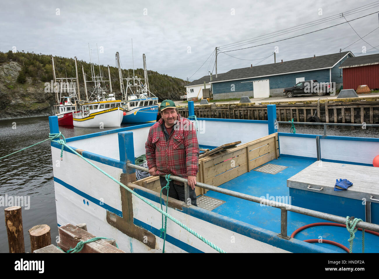 A fisherman and his boat, Trout River, Newfoundland Stock Photo - Alamy