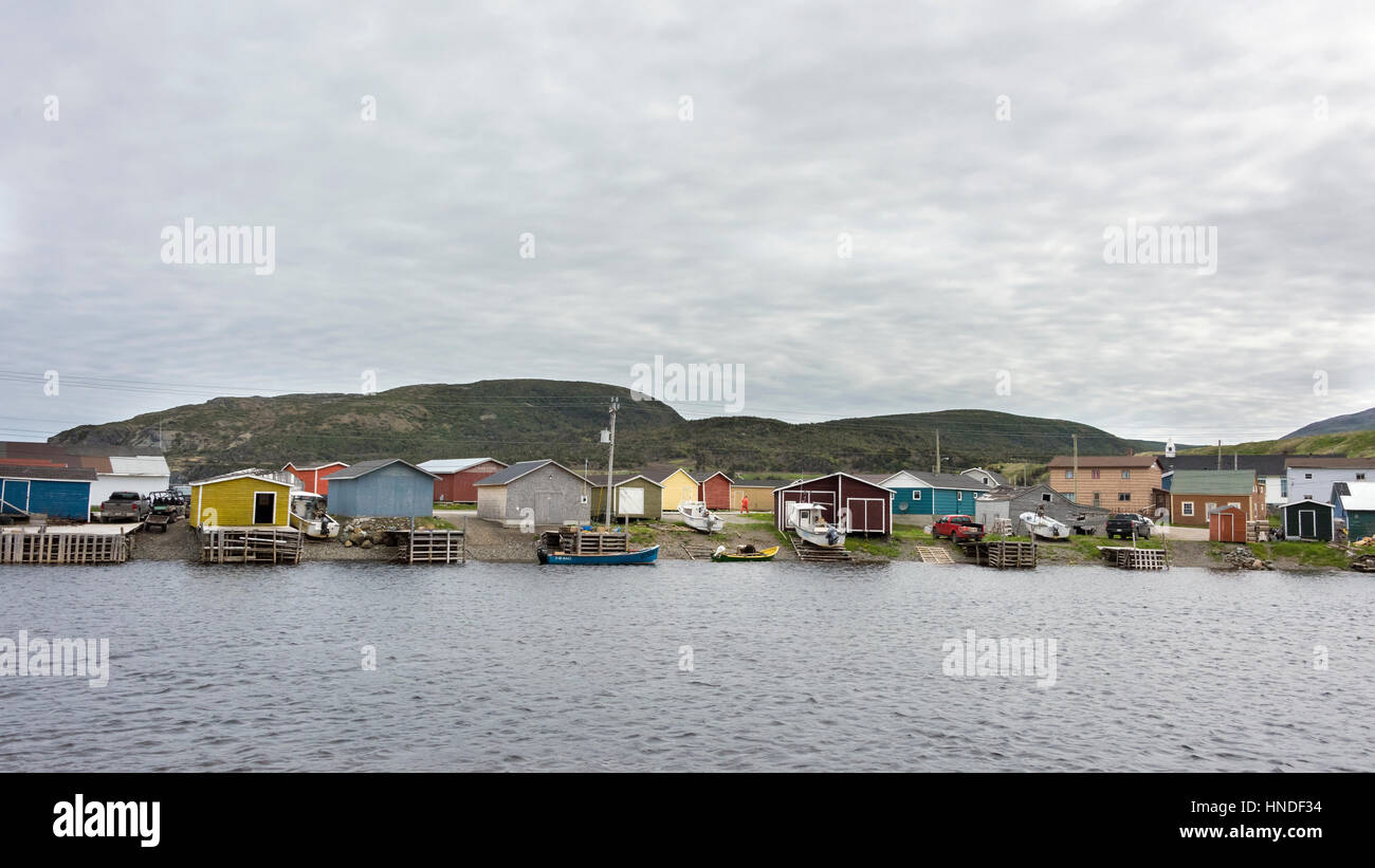 Wharfs, fish shacks, fishing boats and houses, Trout River ...