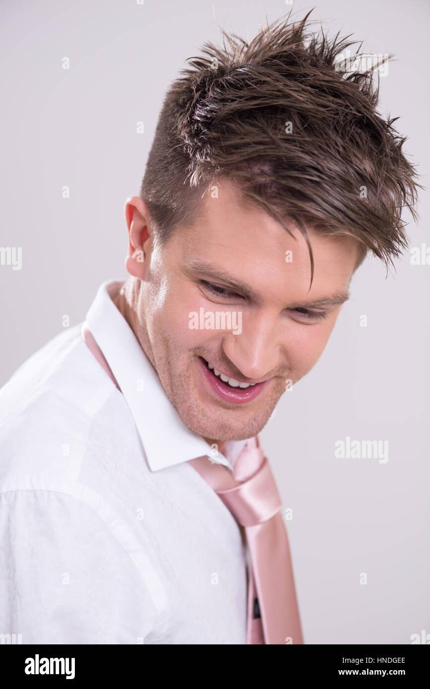 Portrait of a young handsome man in a representative strict clothing ...