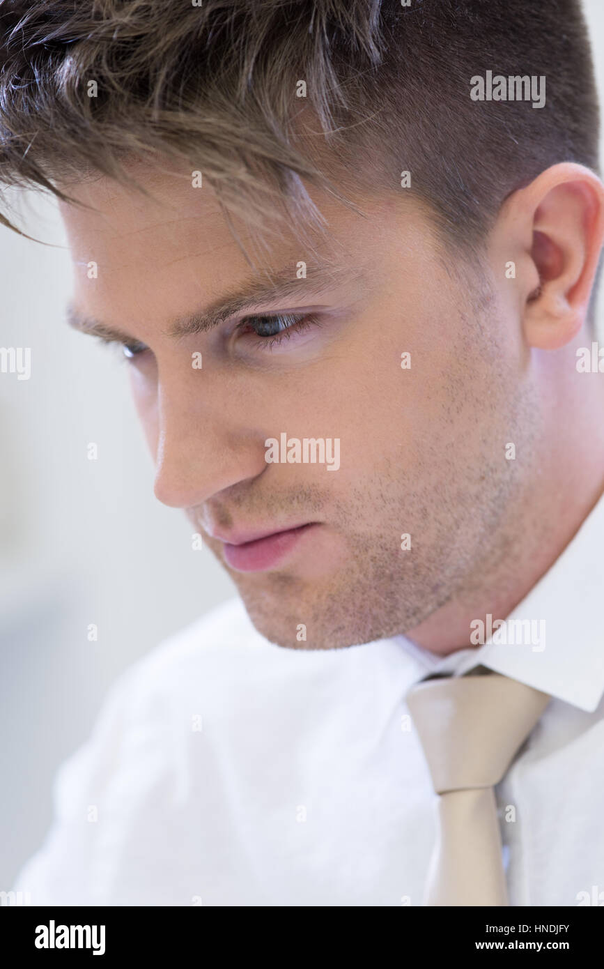 Portrait of a young handsome man in a representative strict clothing ...