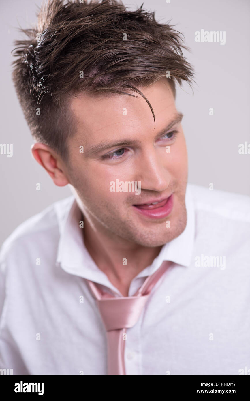 Portrait of a young handsome man in a representative strict clothing ...