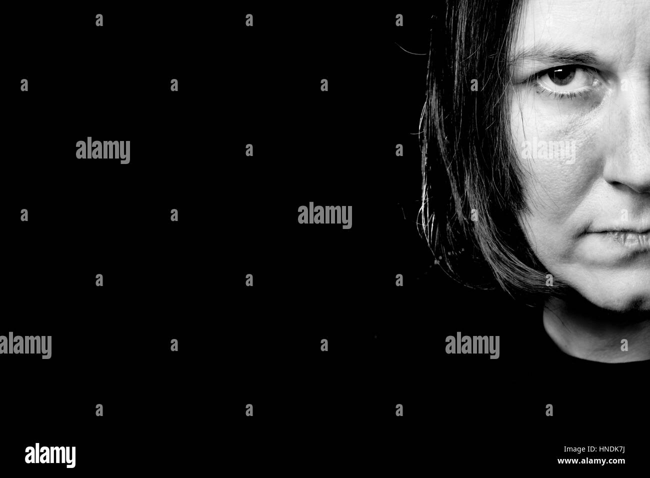 A middle-aged woman scowls at the camera Stock Photo - Alamy