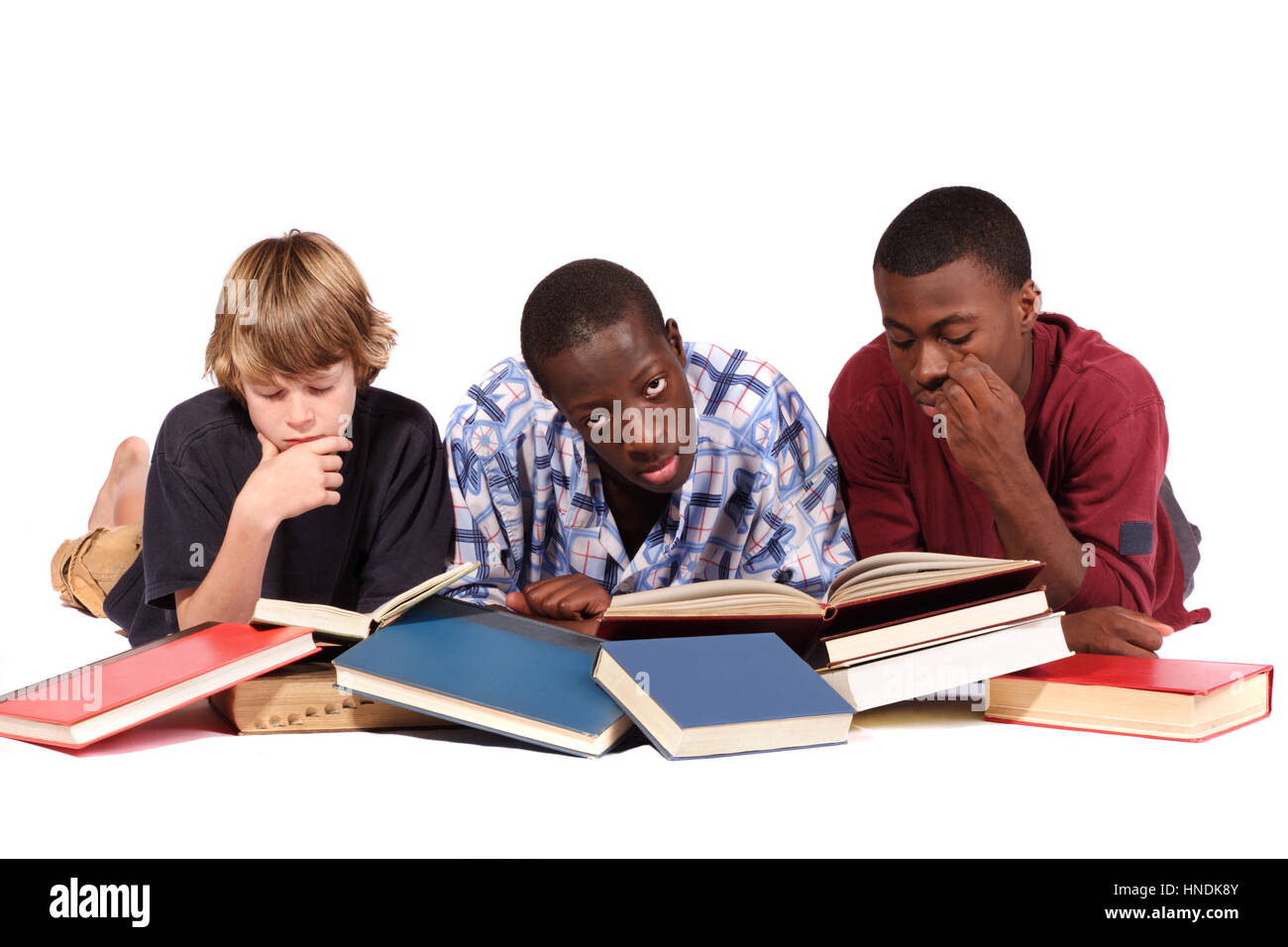 3 teen boys studying Stock Photo - Alamy