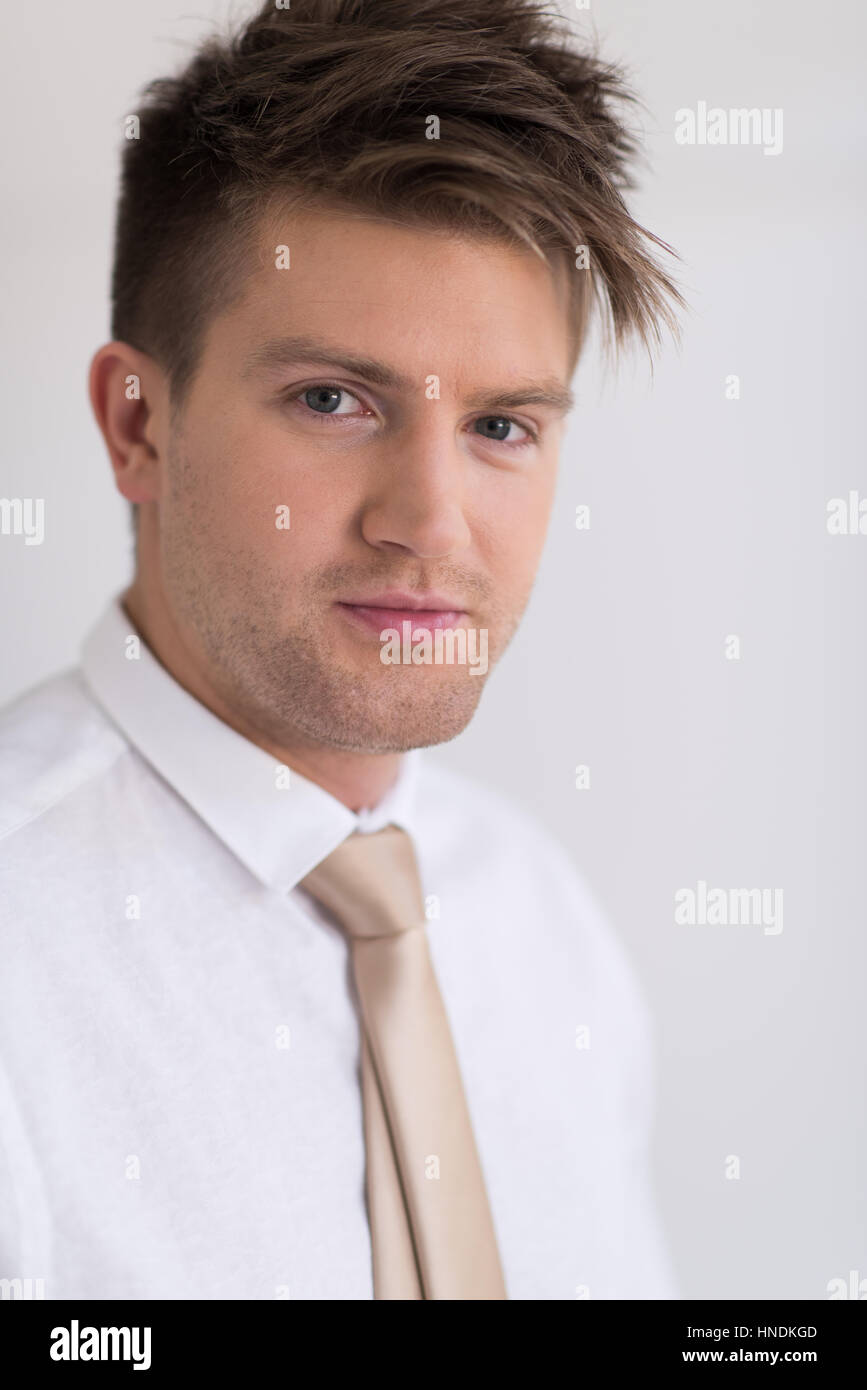 Portrait of a young handsome man in a representative strict clothing ...