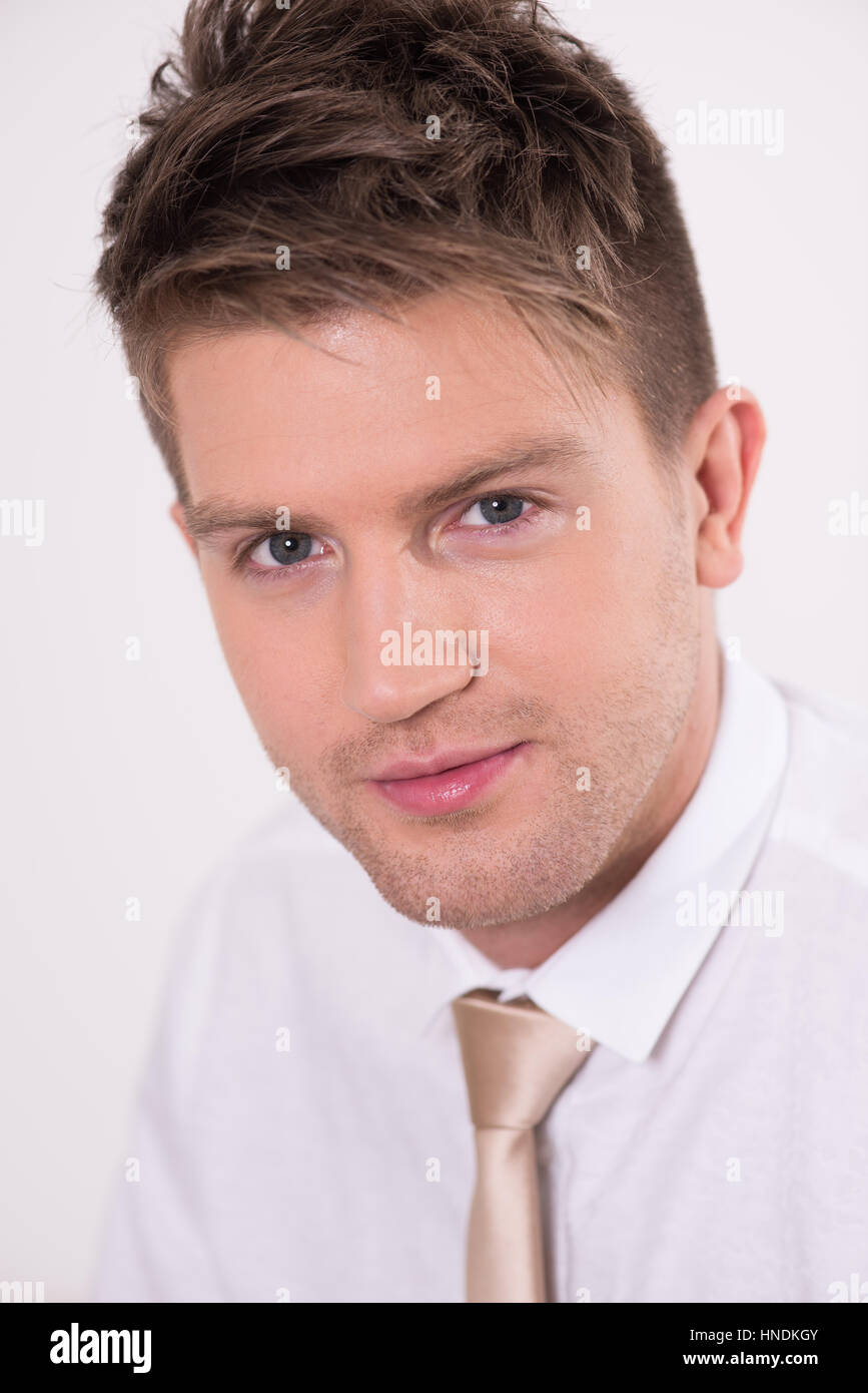 Portrait of a young handsome man in a representative strict clothing ...