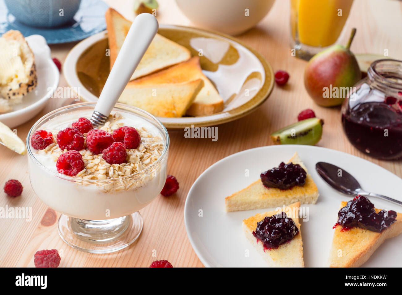 Breakfast table with various food Stock Photo - Alamy