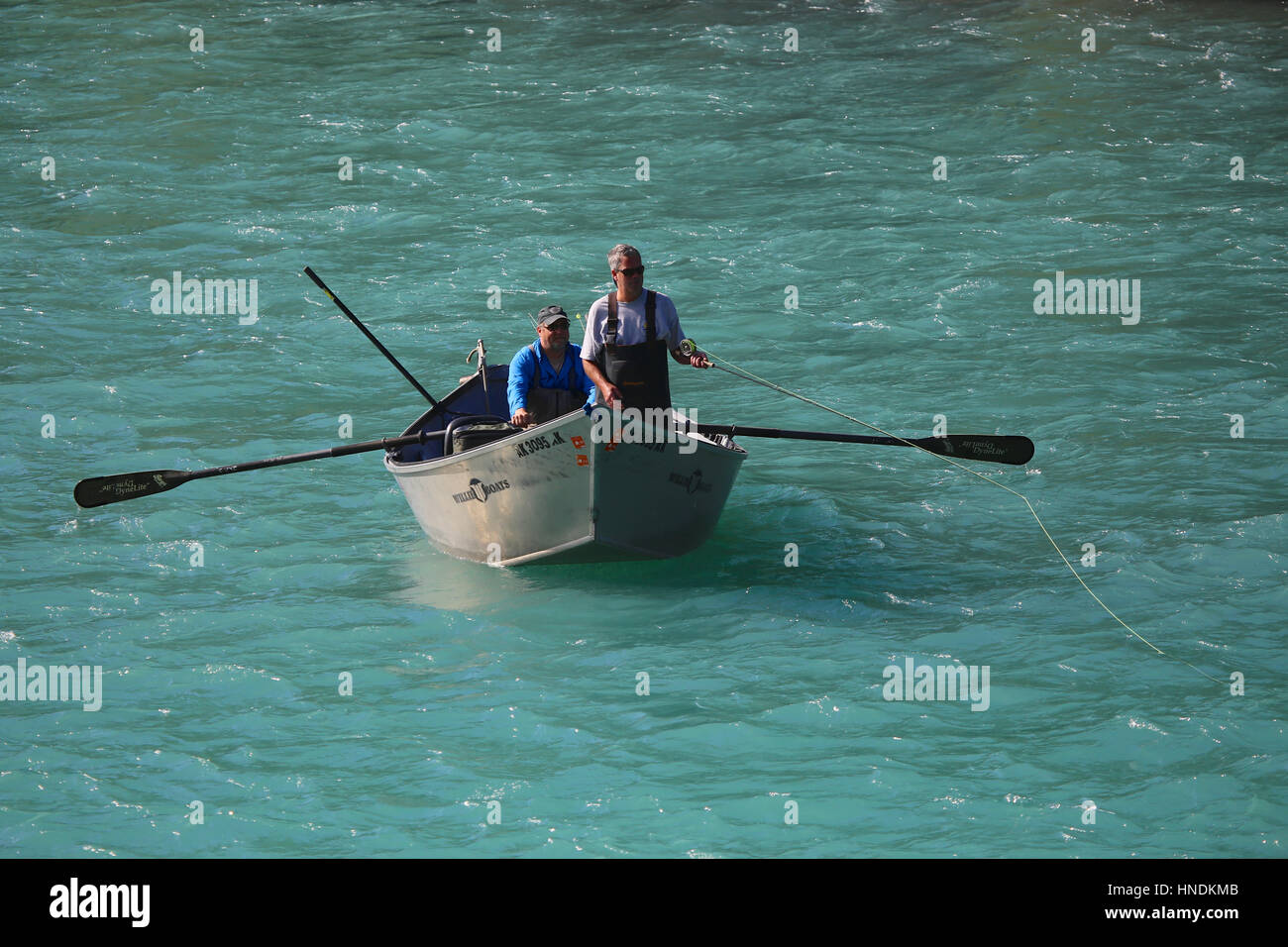 Two men in row boat hi-res stock photography and images - Alamy