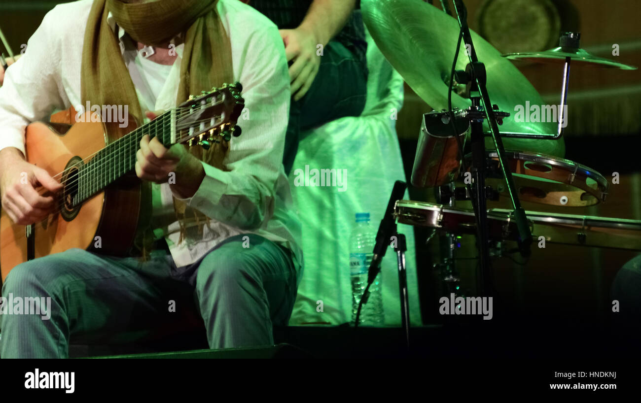 Playing acoustic guitar in a music festival Stock Photo - Alamy