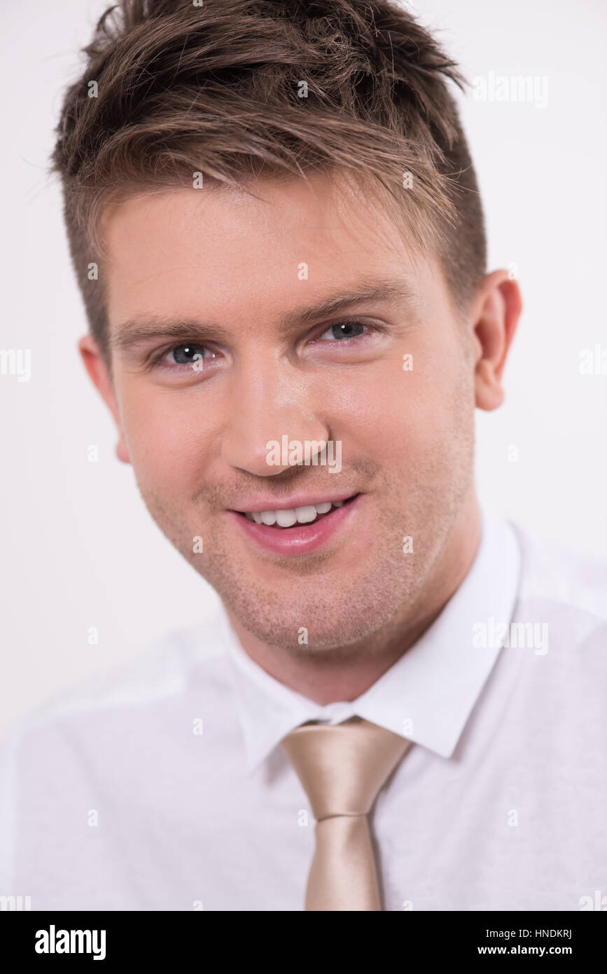 Portrait of a young handsome man in a representative strict clothing ...