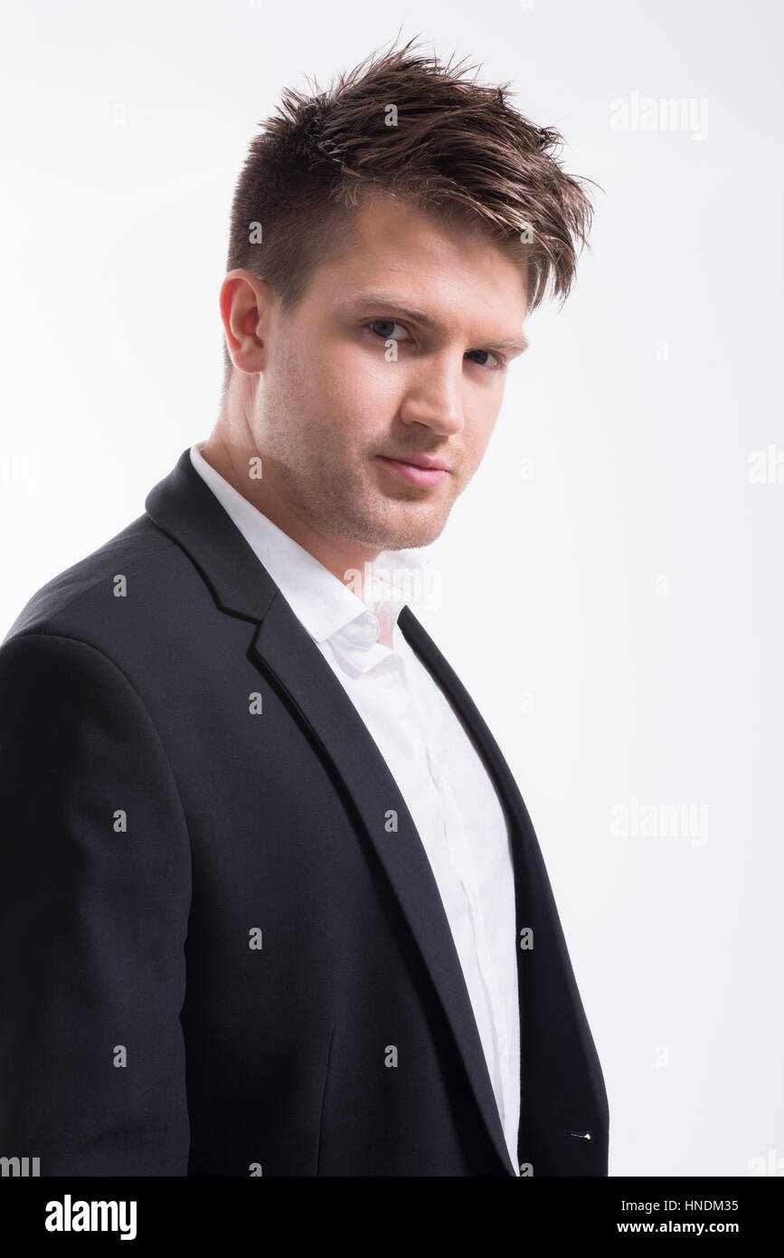 Portrait of a young handsome man in a representative strict clothing ...