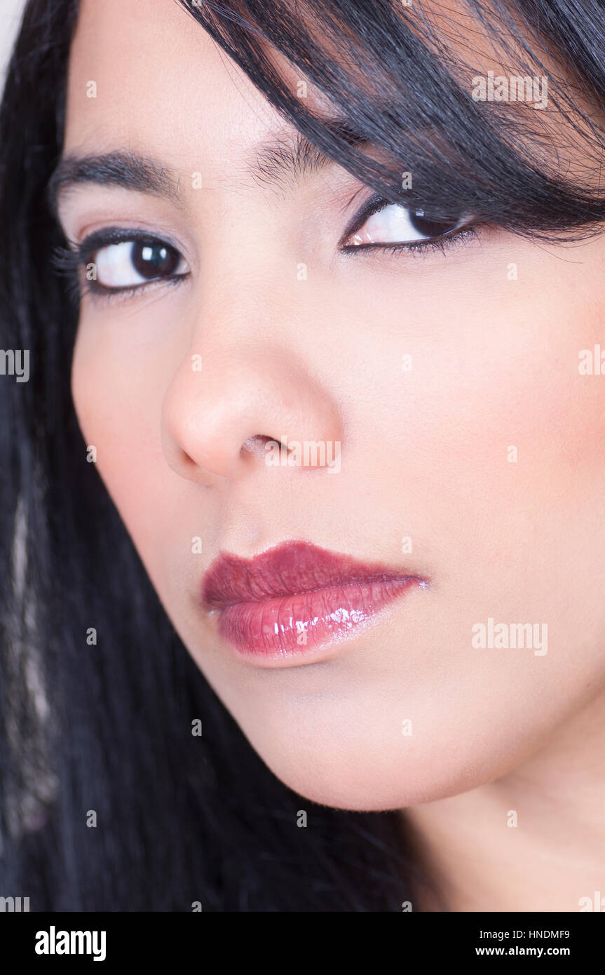 Serious young woman staring Stock Photo - Alamy