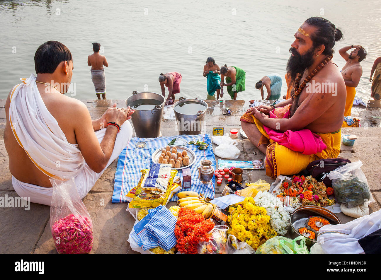 A Pandits (holy man and priest who performs ceremonies) preparing ...