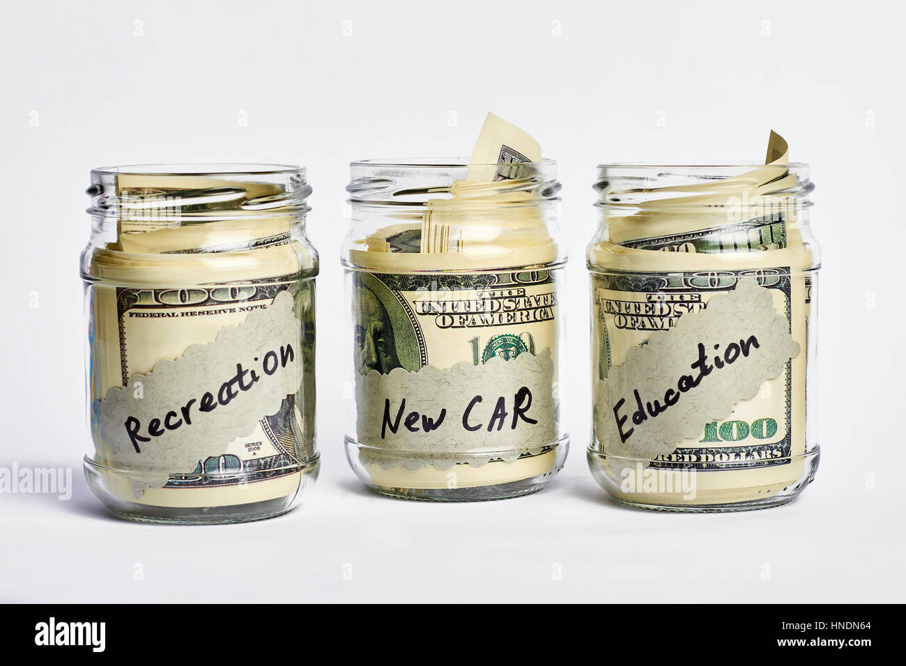 Money jars hi-res stock photography and images - Alamy
