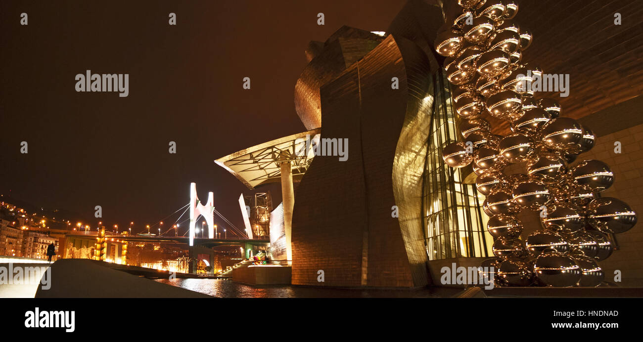 Night view of the Guggenheim Museum Bilbao, the museum of modern and ...
