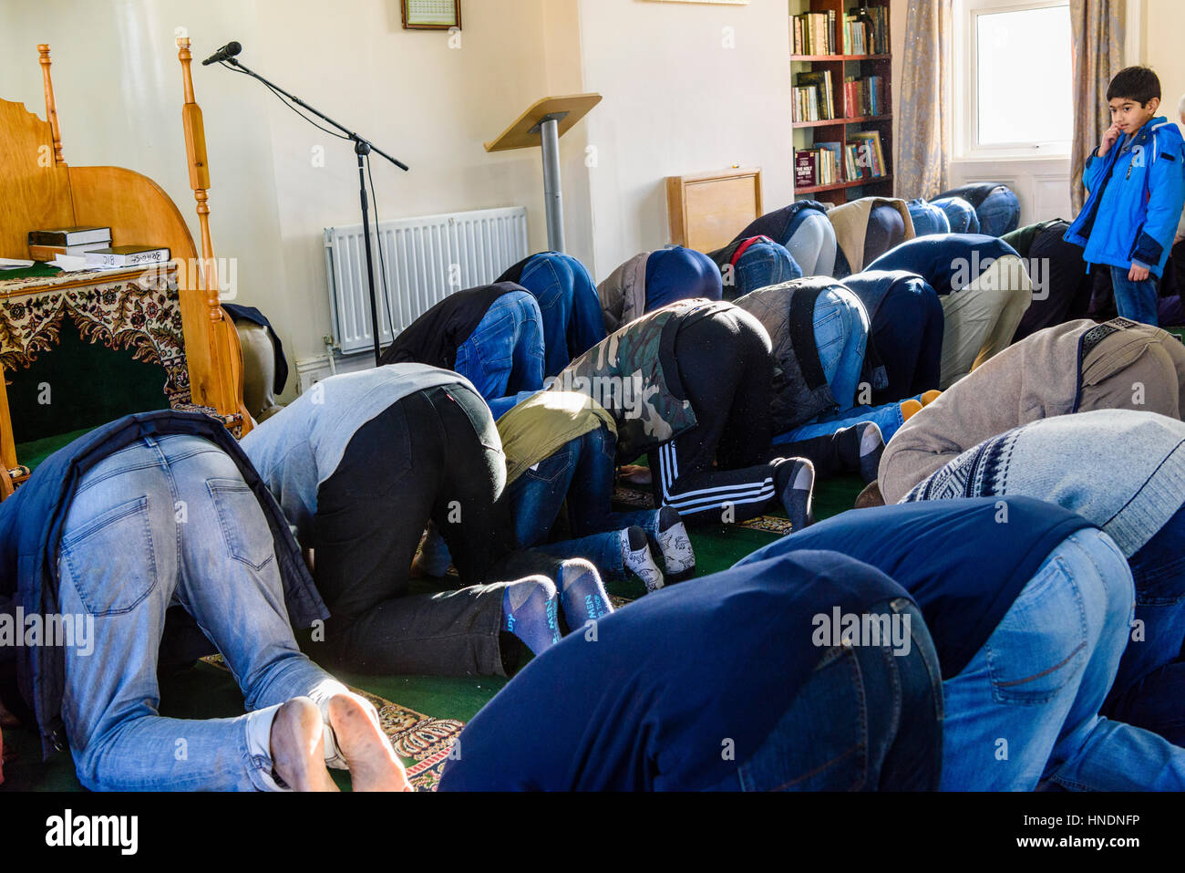 Men pray in a Mosque Stock Photo - Alamy