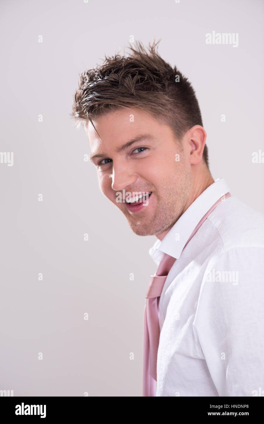 Portrait of a young handsome man in a representative strict clothing ...