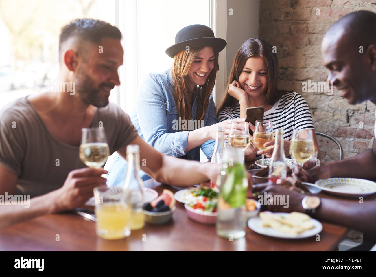 Two friends having dinner together hi-res stock photography and images ...