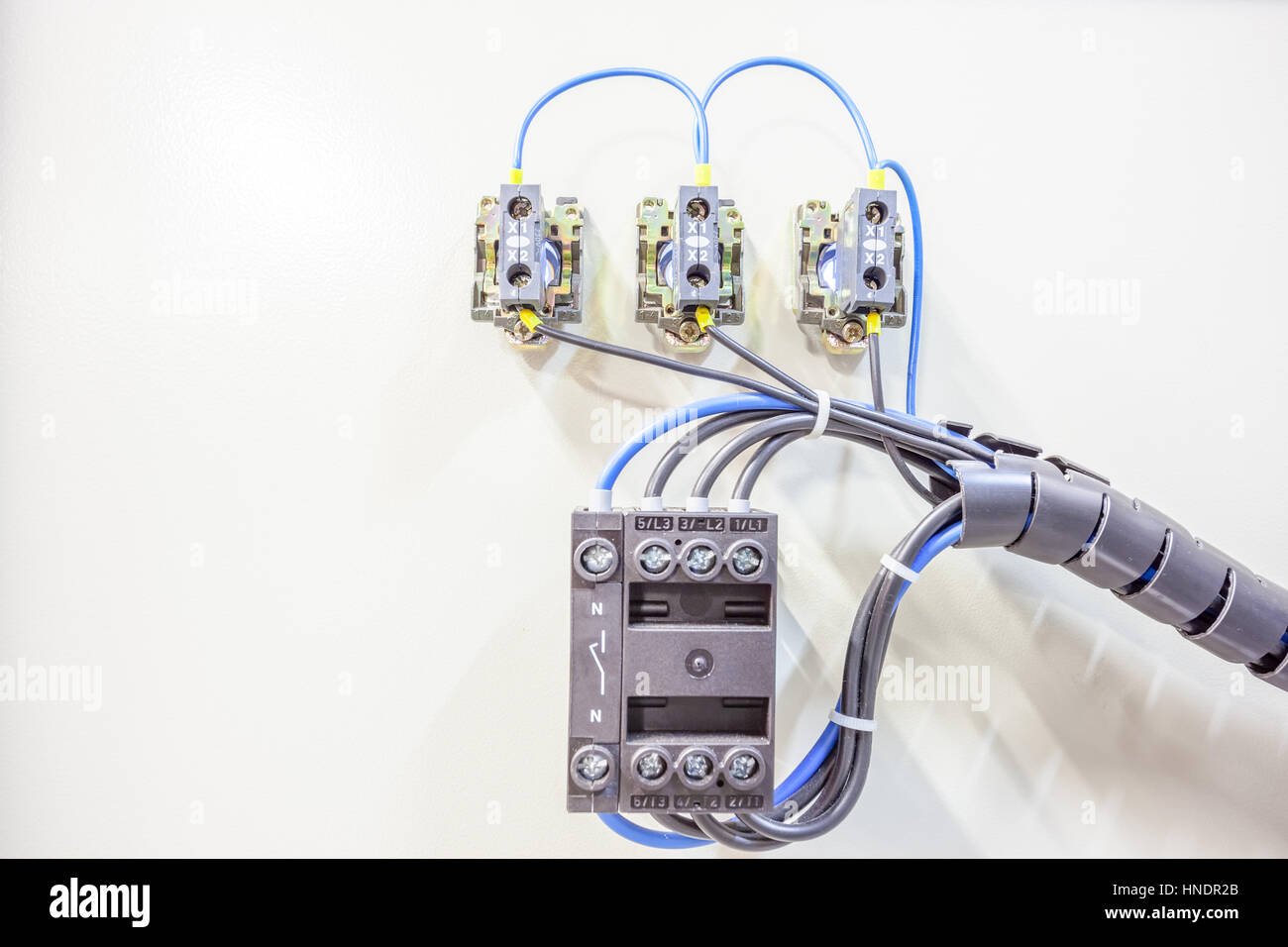 on the wall, there are mounted electric circuits Stock Photo - Alamy
