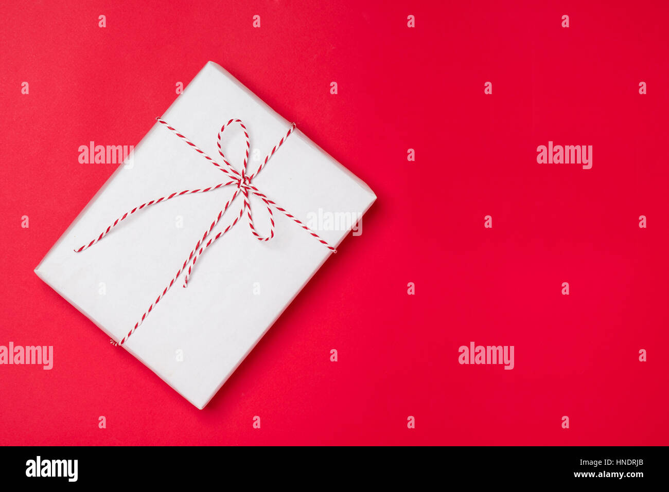 Happy birthday and gift box on red background Stock Photo - Alamy