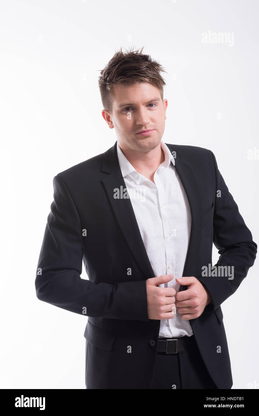 Portrait of a young handsome man in a representative strict clothing ...